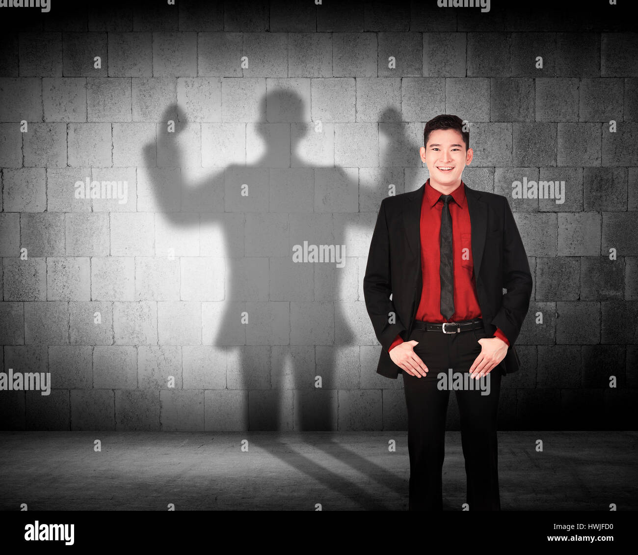 Asian business man casting a shadow of strength career concept Stock ...