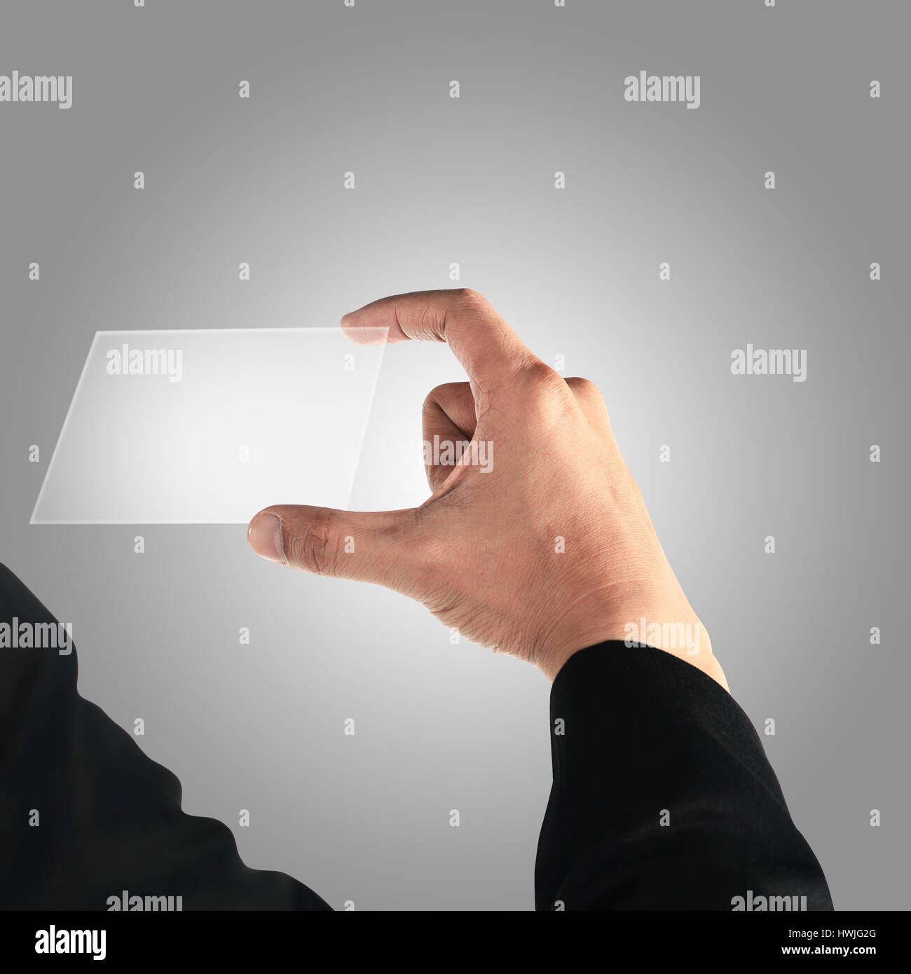 Business man holding transparent card. You can put your design on the ...