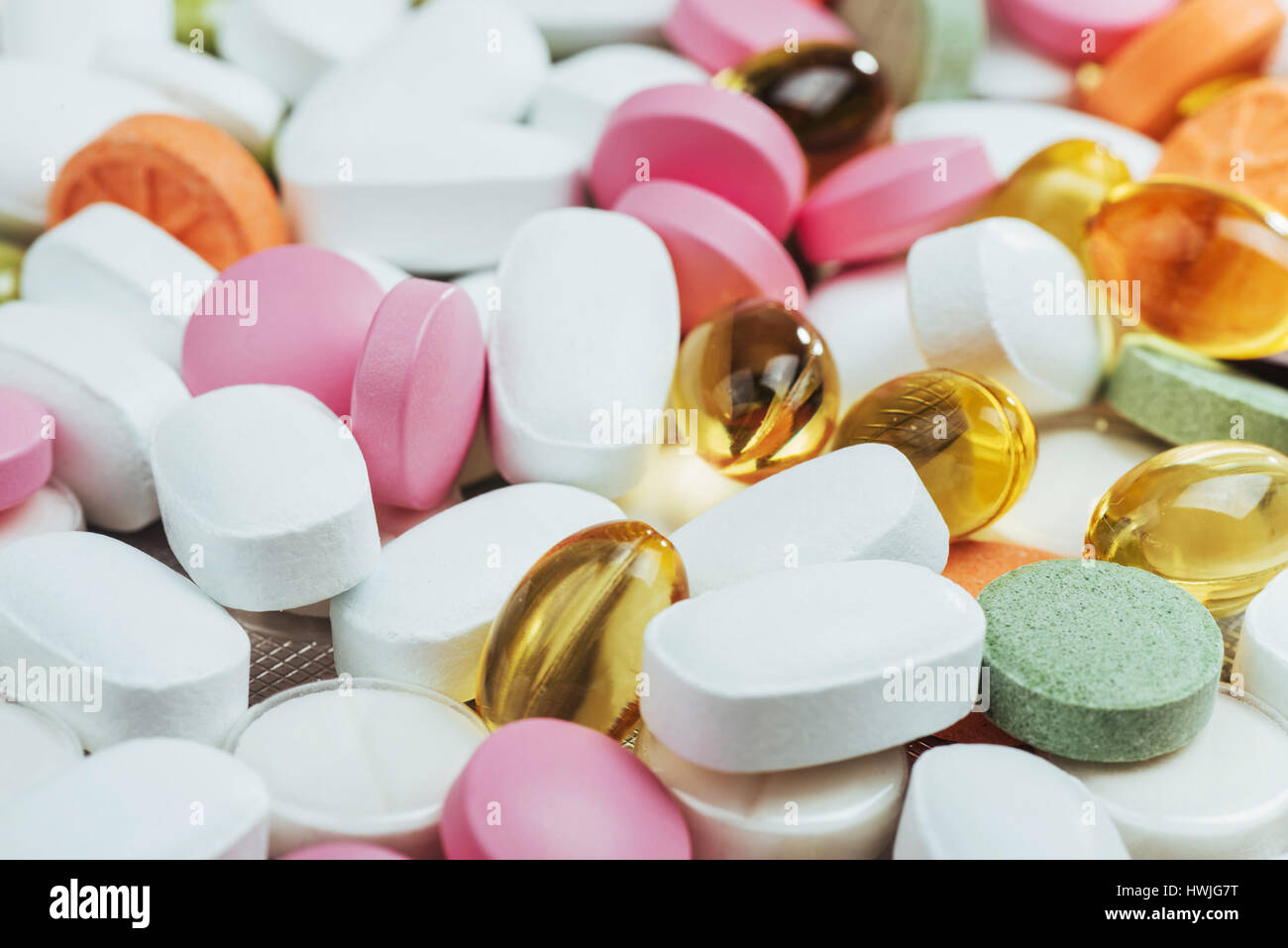 Medical colorful pills, capsules or supplements for the treatment and ...