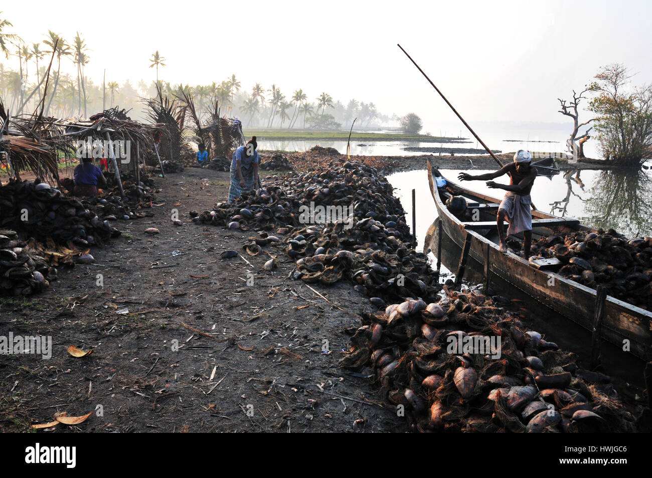 Coir workers at Kadinamkulam lake near Chirayinkeesh ...