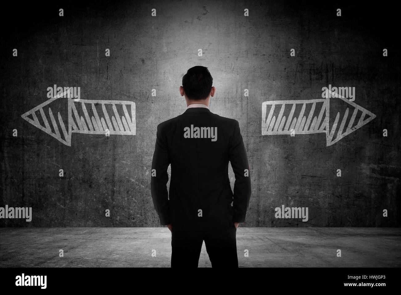 Business man has to choose between two way. Business option conceptual ...