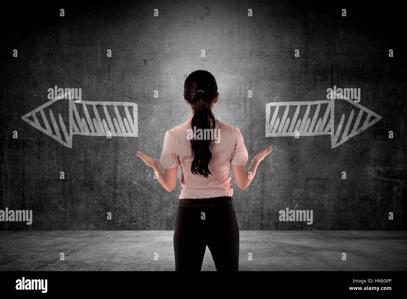 Business woman has to choose between two way. Business option ...