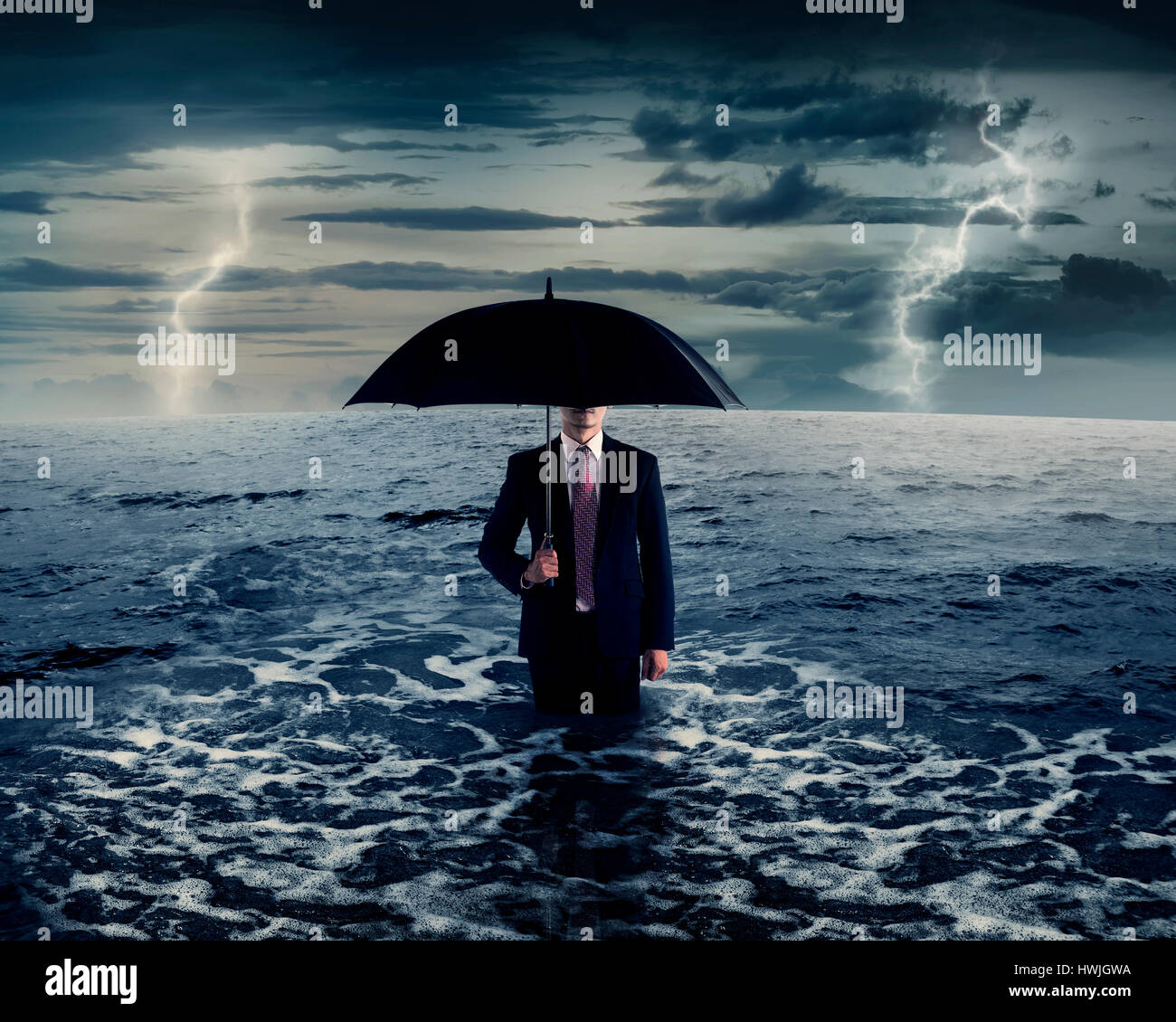 Umbrella man suit flood hi-res stock photography and images - Alamy