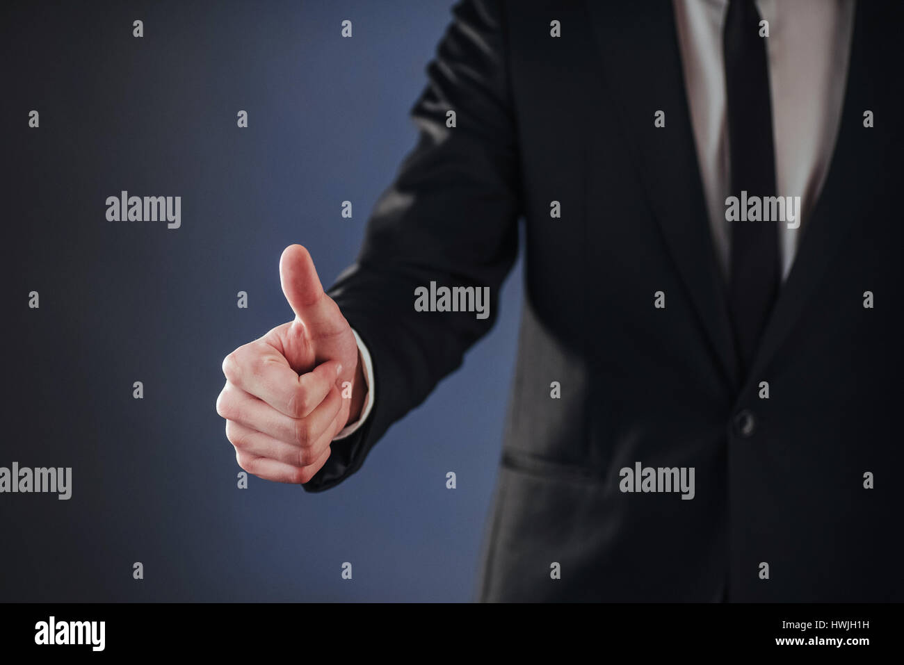 A man passing by using biometric fingerprint reader Stock Photo - Alamy