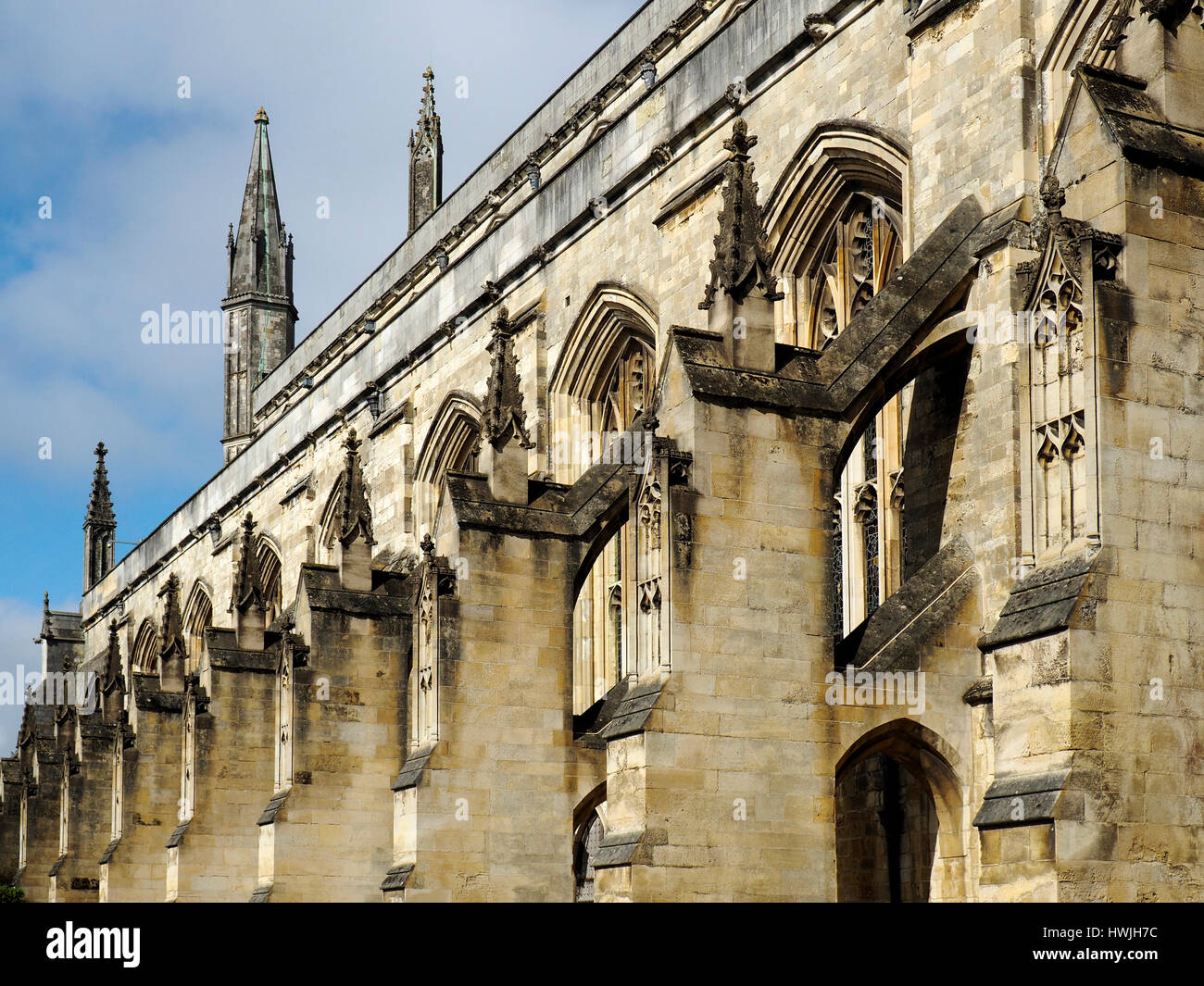 The gothic arches and flying butresses of Winchester Cathedral ...