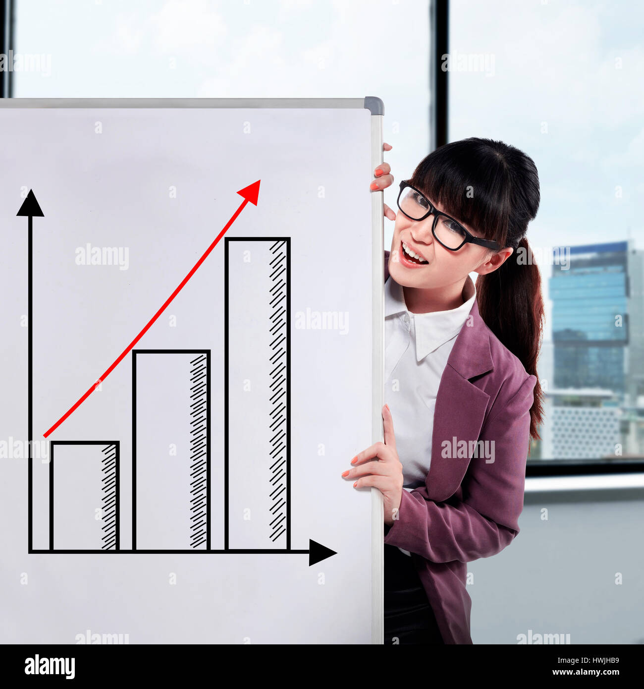 Asian business woman draw chart on the whiteboard Stock Photo - Alamy