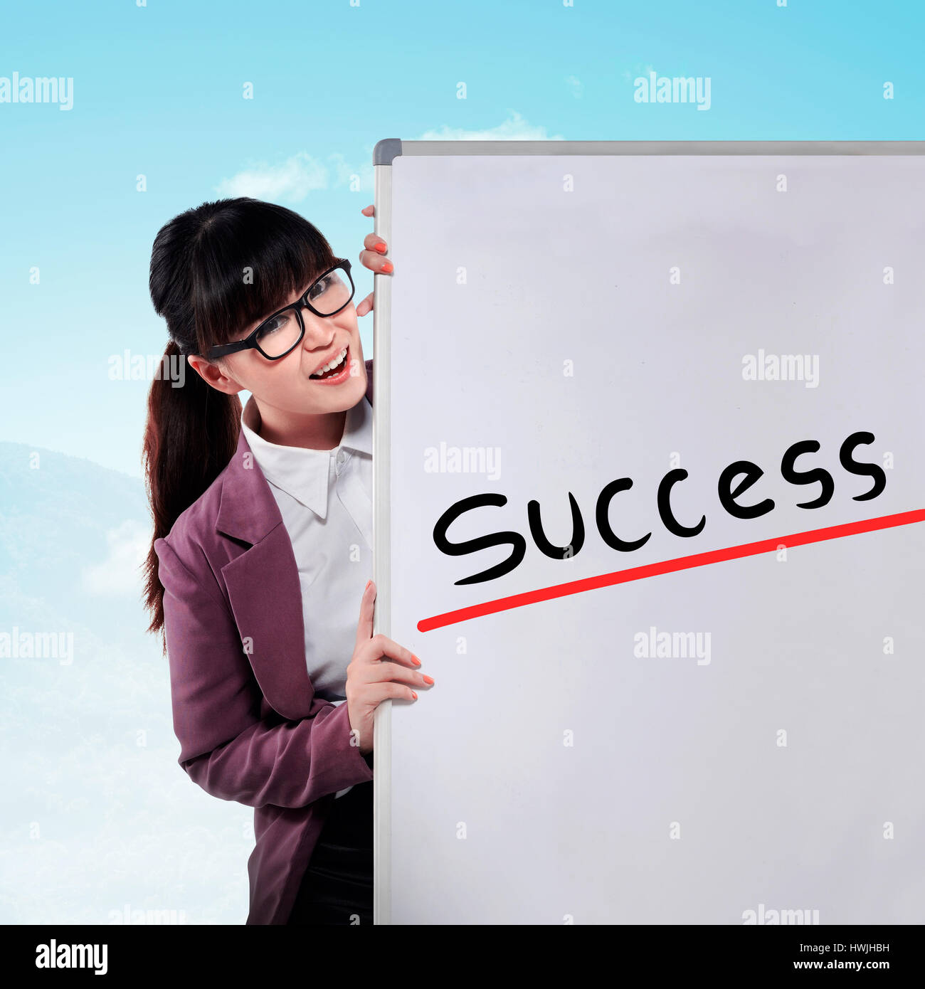 Asian business woman write success on the whiteboard Stock Photo - Alamy