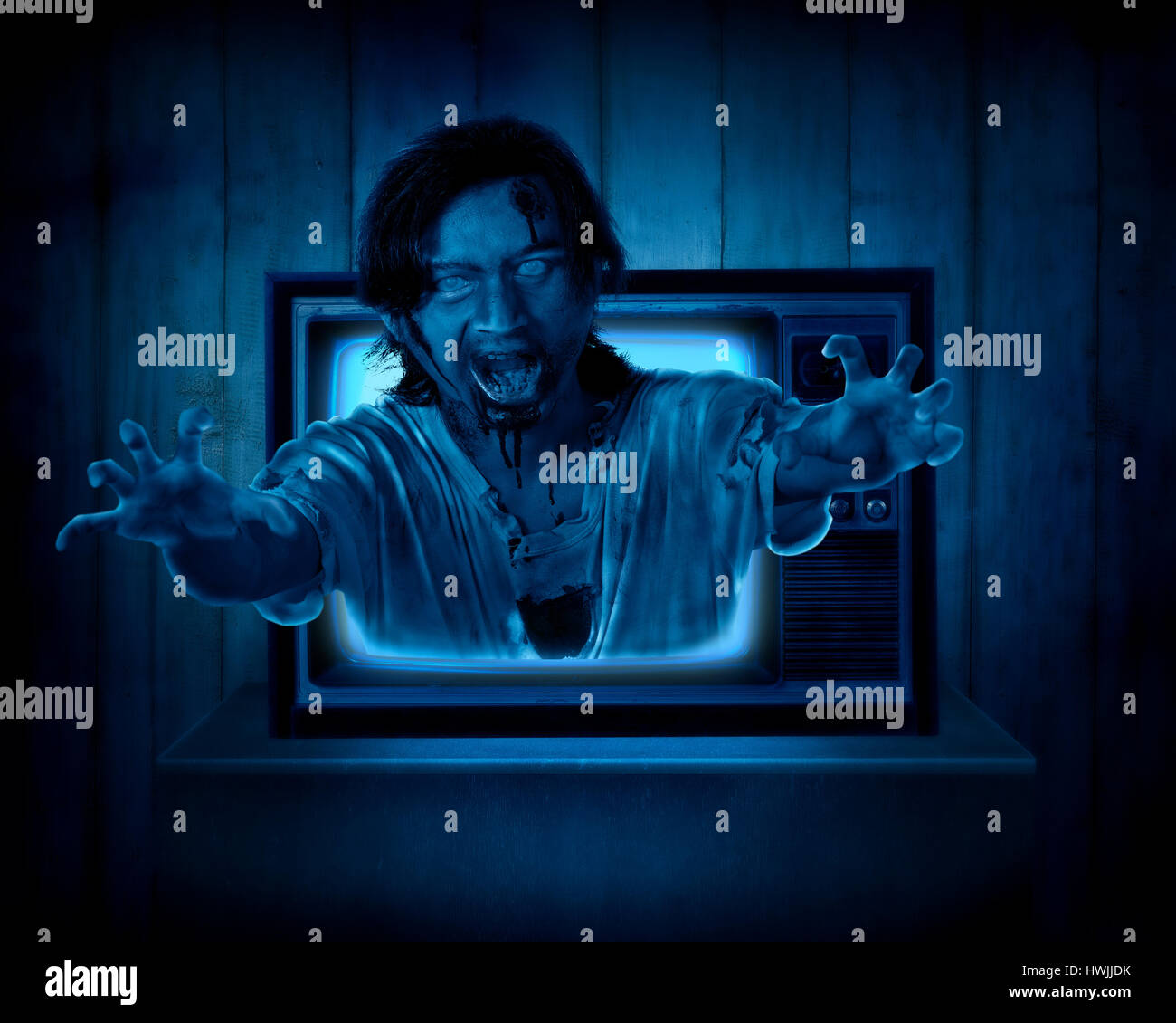 Scary ghost out from old television. Halloween concept Stock Photo - Alamy