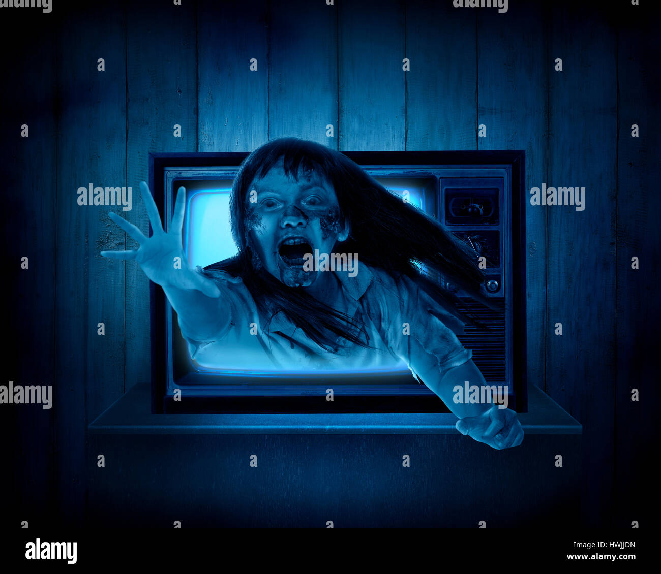 Scary ghost out from old television. Halloween concept Stock Photo - Alamy