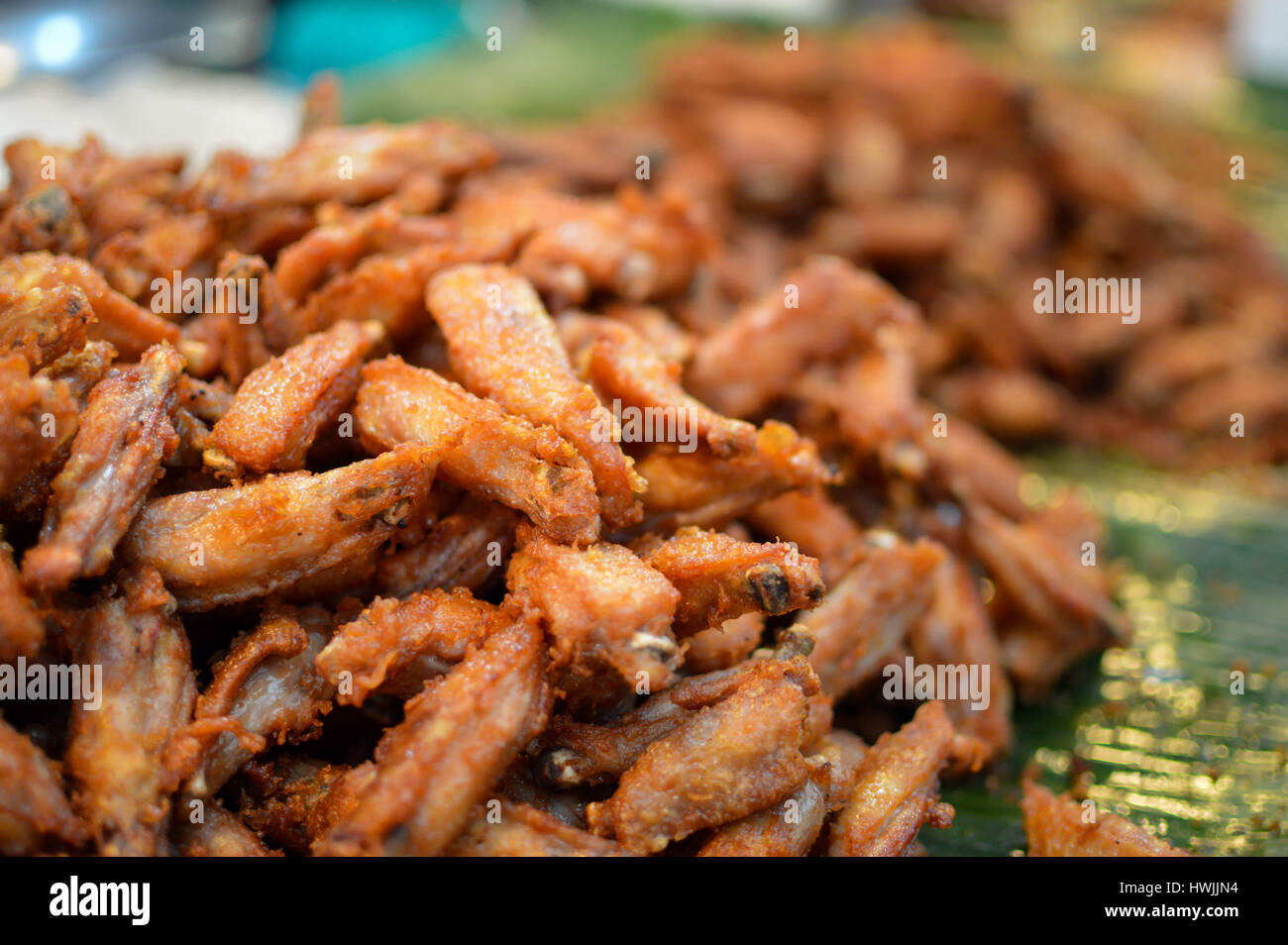 Cuts of the crispy fried fatty pork sold from the outdoors stall in the ...