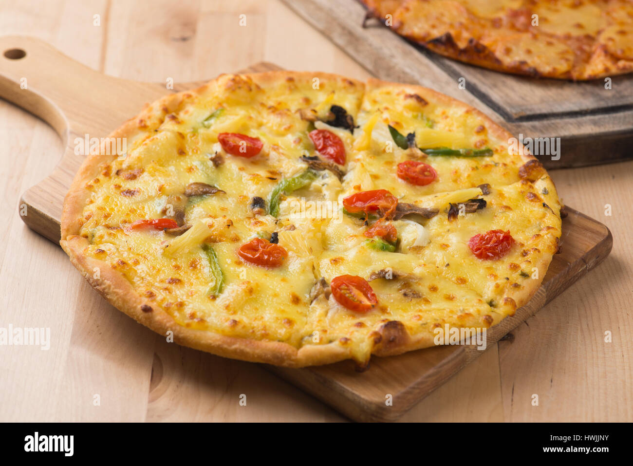 pizza with rustic background Stock Photo - Alamy