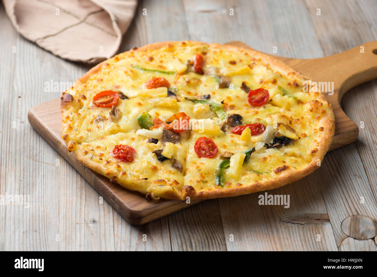 pizza with rustic background Stock Photo - Alamy