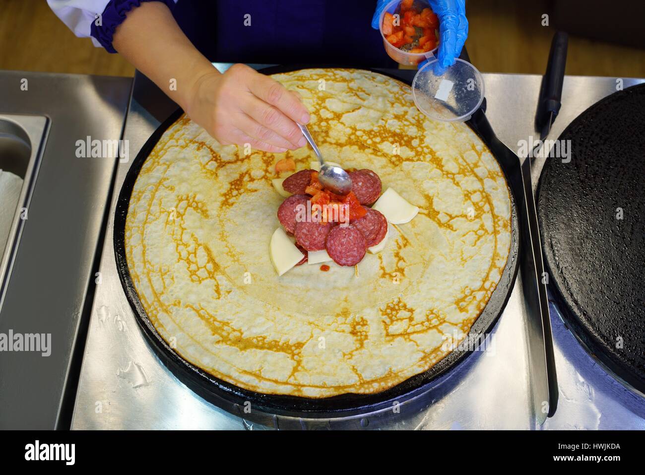 Pancake on frying pan view from above in a cafe Stock Photo - Alamy