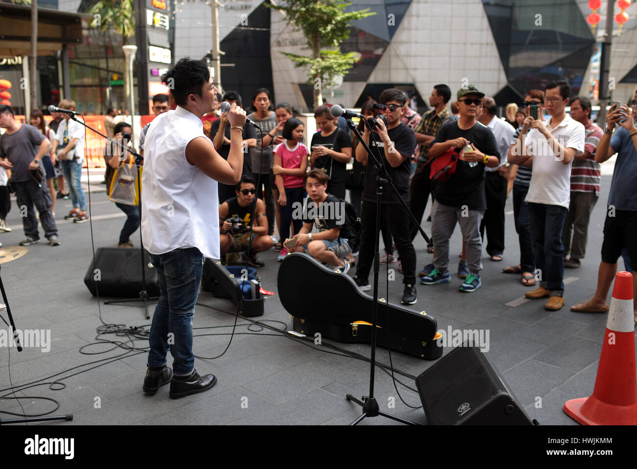 Issac Dang, Malaysia-born Taiwan singer performing outside the Pavilion ...