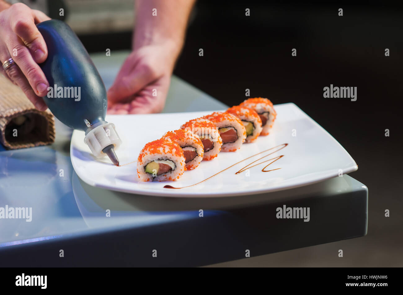 Cook serving hi-res stock photography and images - Alamy