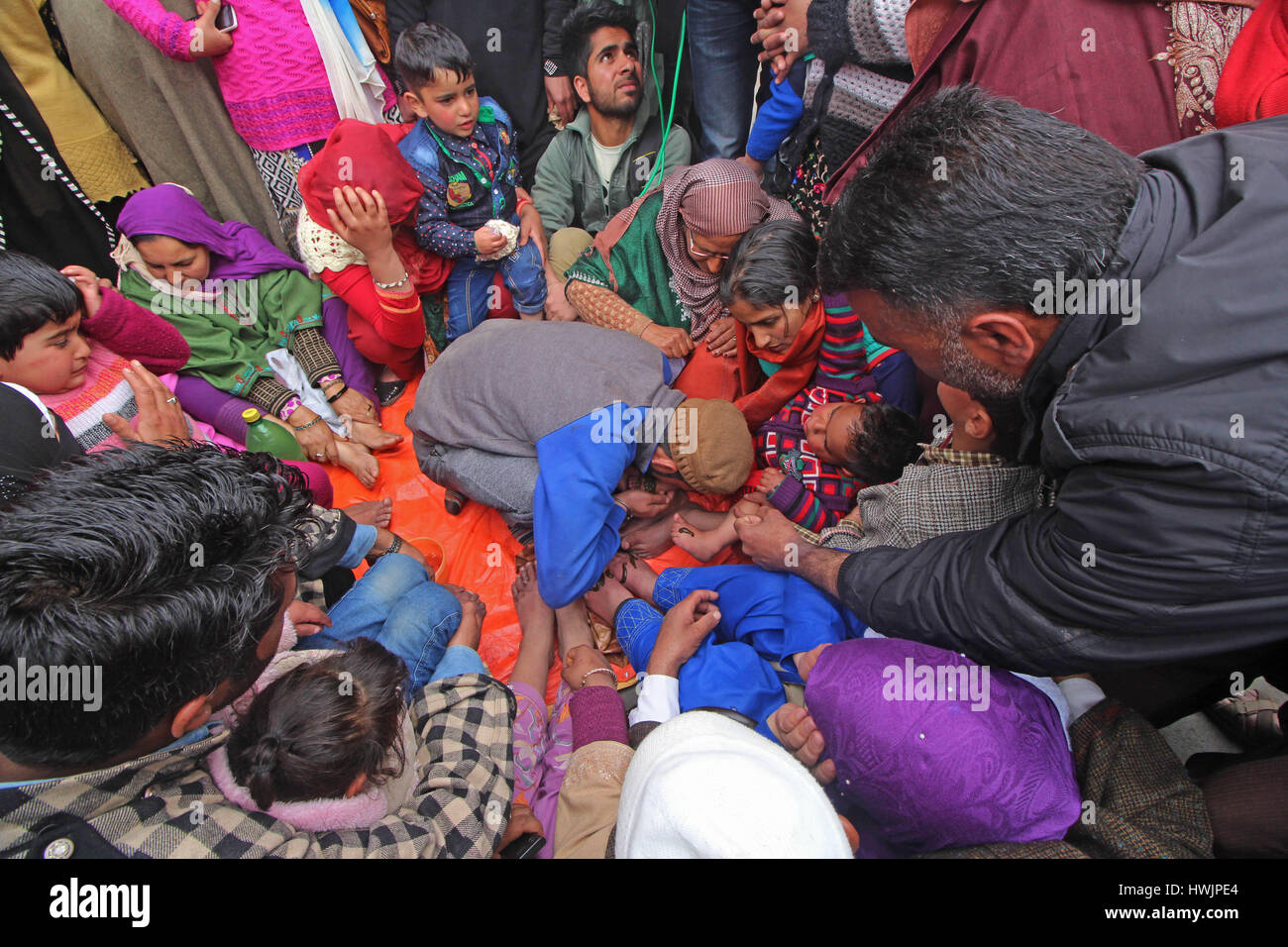 Practitioners give leech therapy to Kashmiri children on March 21, 2017 ...