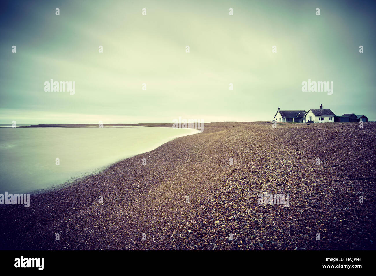 Cottage on Beach at Shingle Street in Suffolk Stock Photo - Alamy
