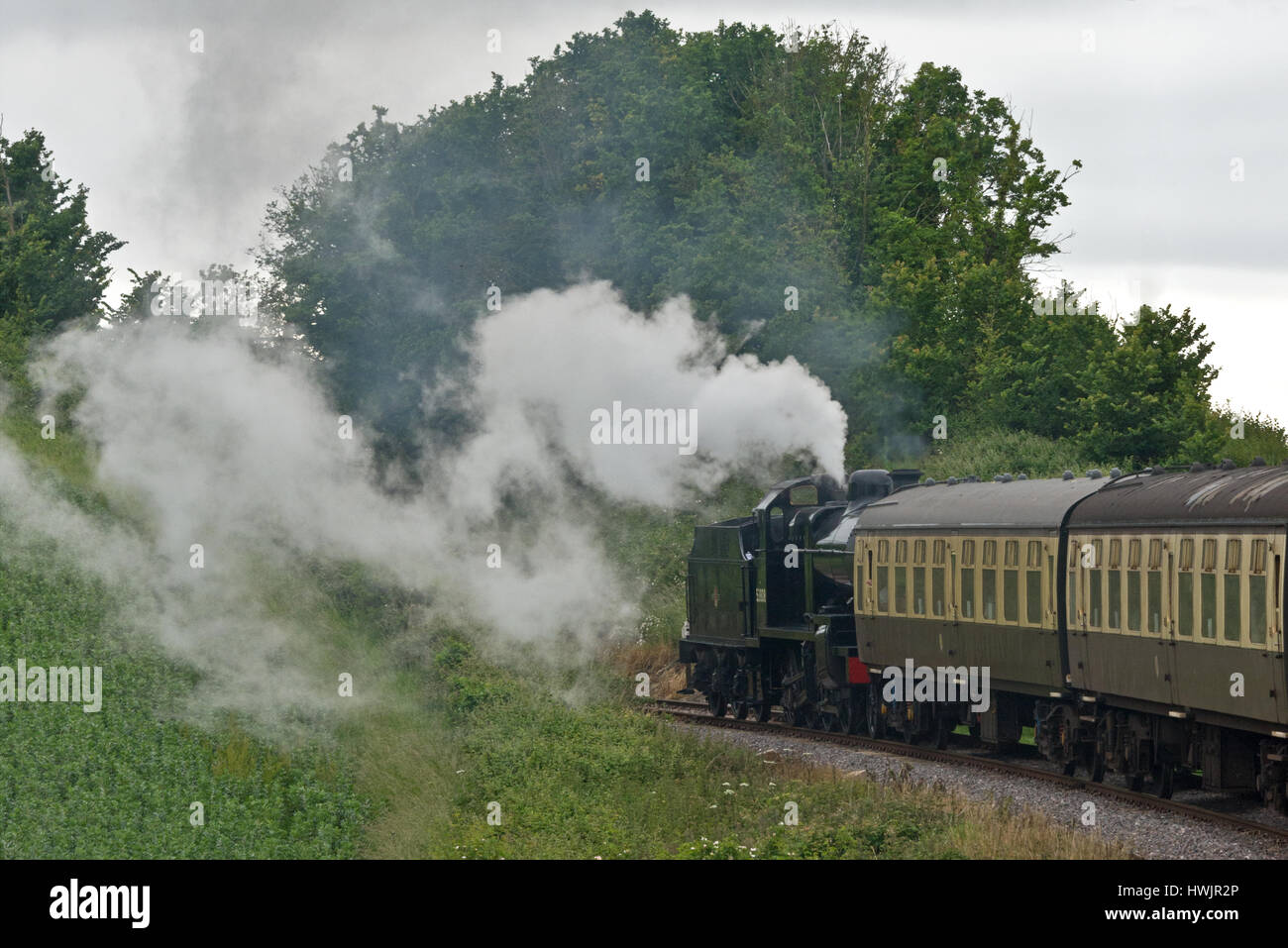 Steam locomotive 53808 pulling a train from Bishops Lydeard to Minehead in Somerset on the West ...