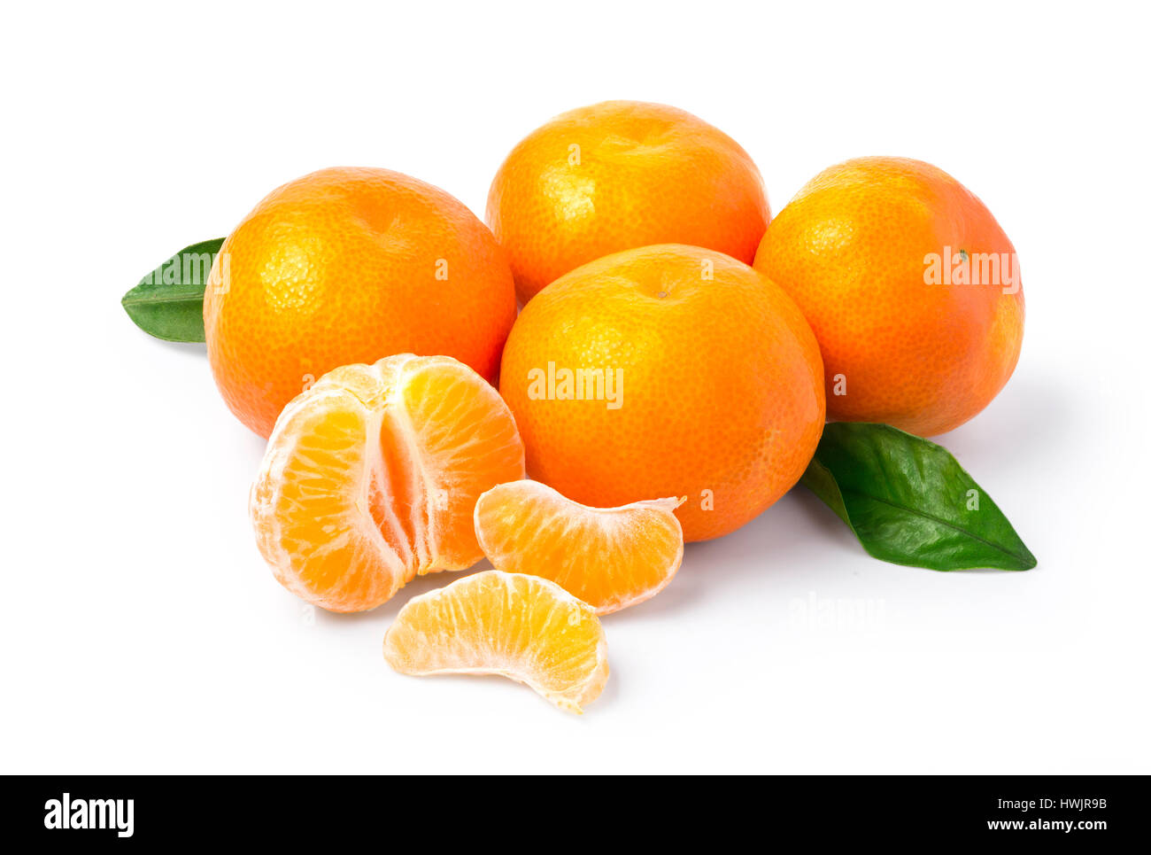 Ripe mandarin with leaves close-up on a white background. with clipping ...