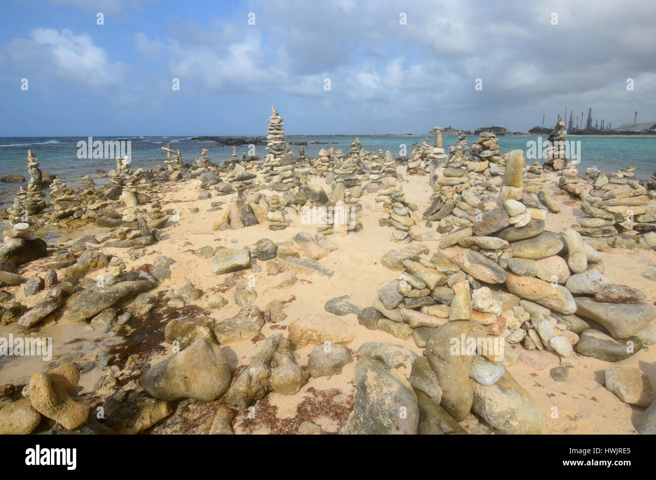Stacked stones in Aruba on Baby Beach Stock Photo - Alamy