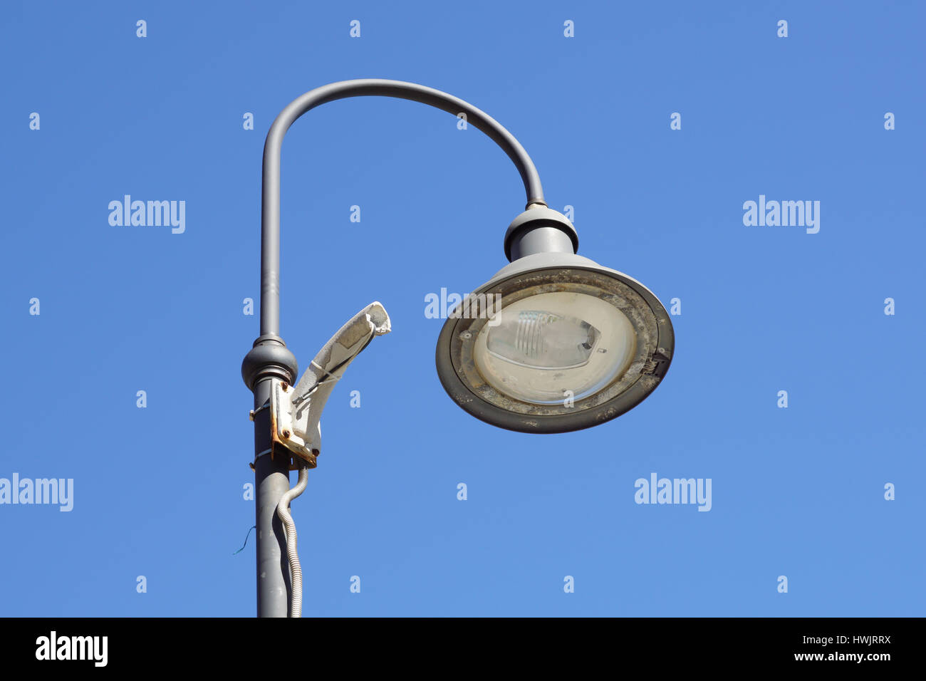 Support for broken security camera on light pole Stock Photo - Alamy