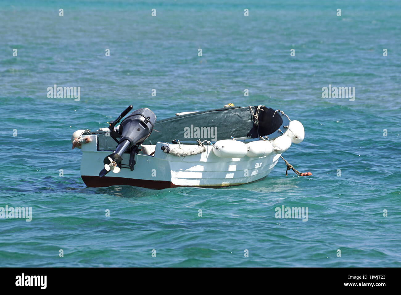 small boat in the sea Stock Photo - Alamy