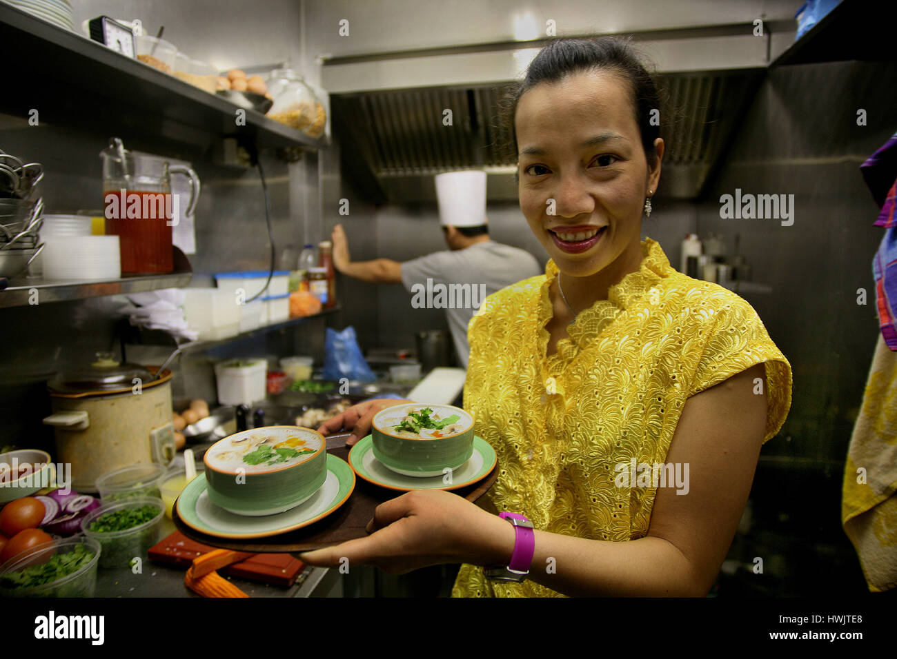 Thai waitress serving food hi-res stock photography and images - Alamy