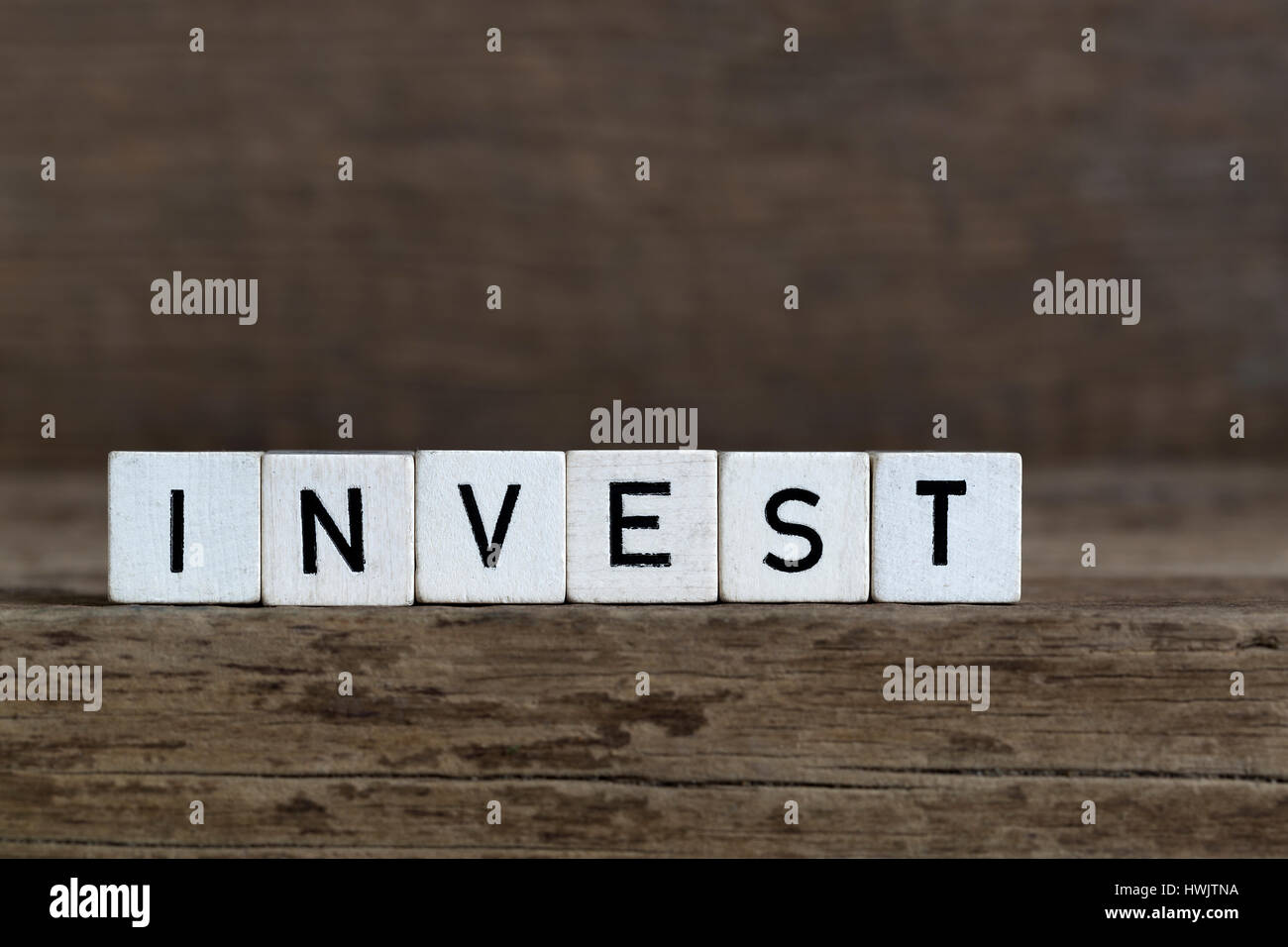 Invest letters hi-res stock photography and images - Alamy