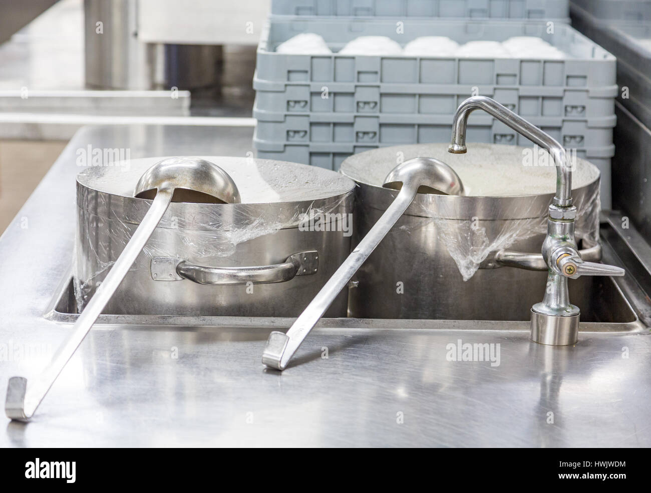Ladles on Stock Pots in Commercial Kitchen Stock Photo - Alamy