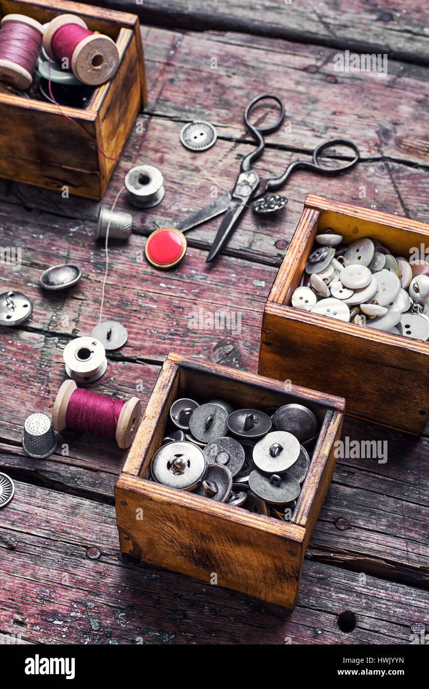 set of buttons from the clothing in wooden boxes in retro style Stock ...