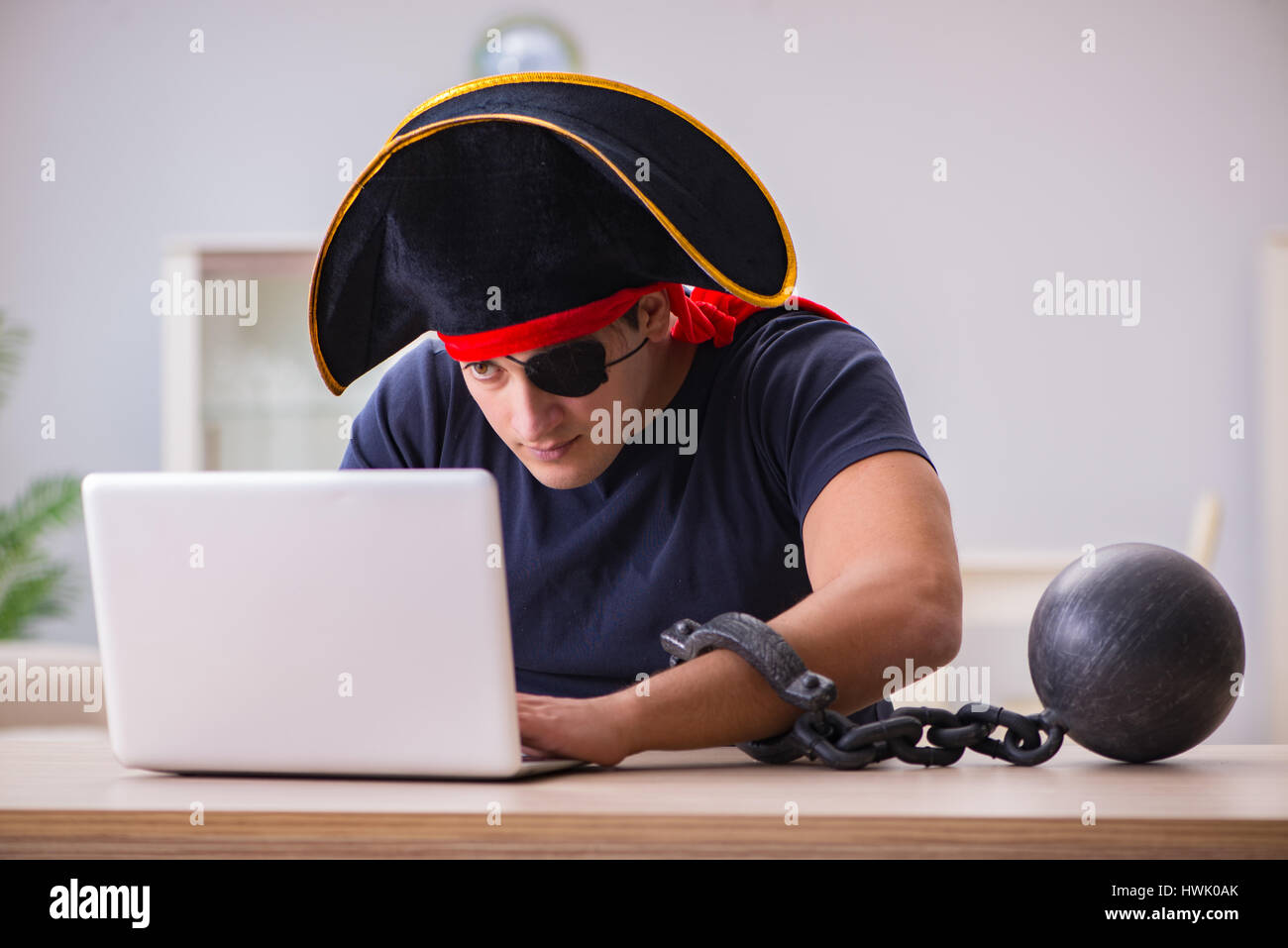 Digital security concept with pirate at computer Stock Photo - Alamy