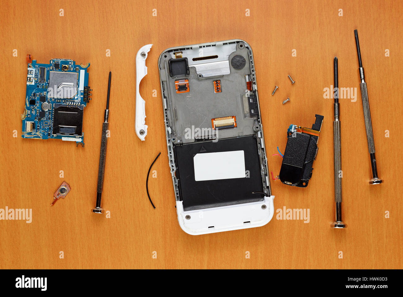 Broken smartphone on table top view Stock Photo - Alamy