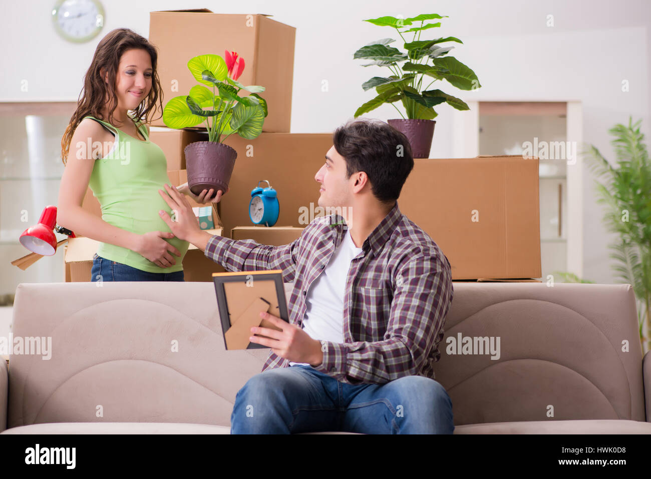 Young couple of man and pregnant wife expecting baby Stock Photo - Alamy