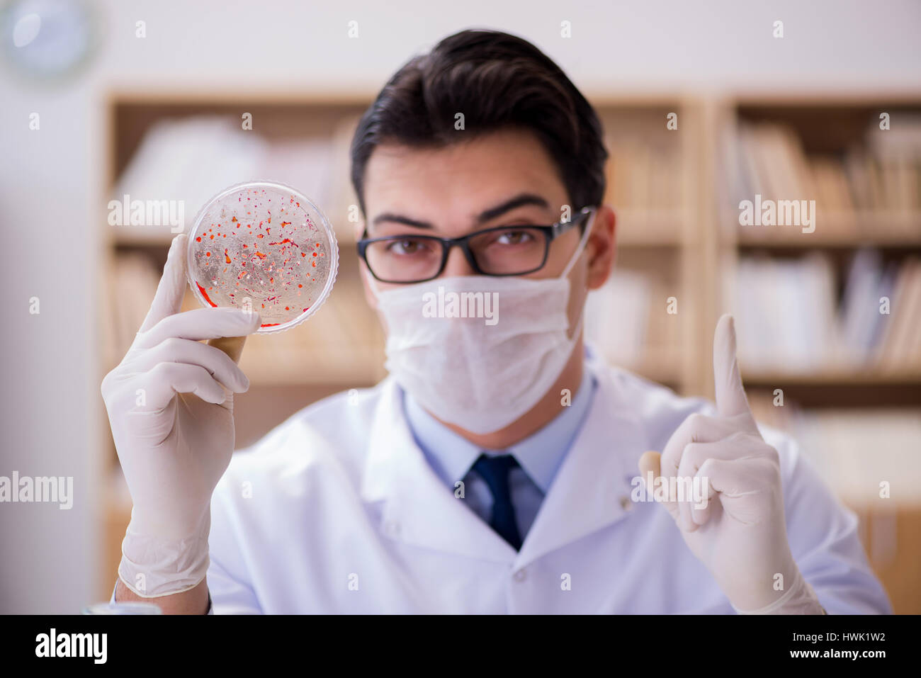 Doctor studying virus bacteria in the lab Stock Photo - Alamy