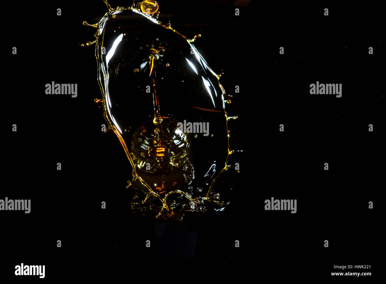 Images forming two drops of water when colliding after falling in water ...
