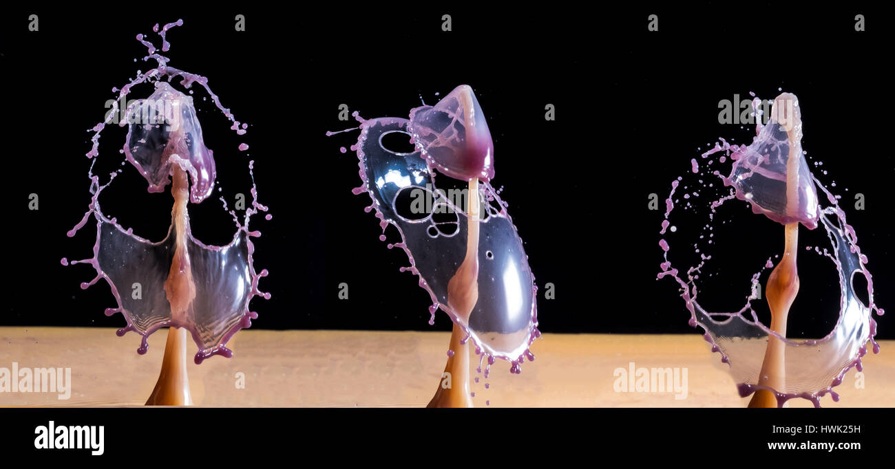 Images forming two drops of water when colliding after falling in water ...