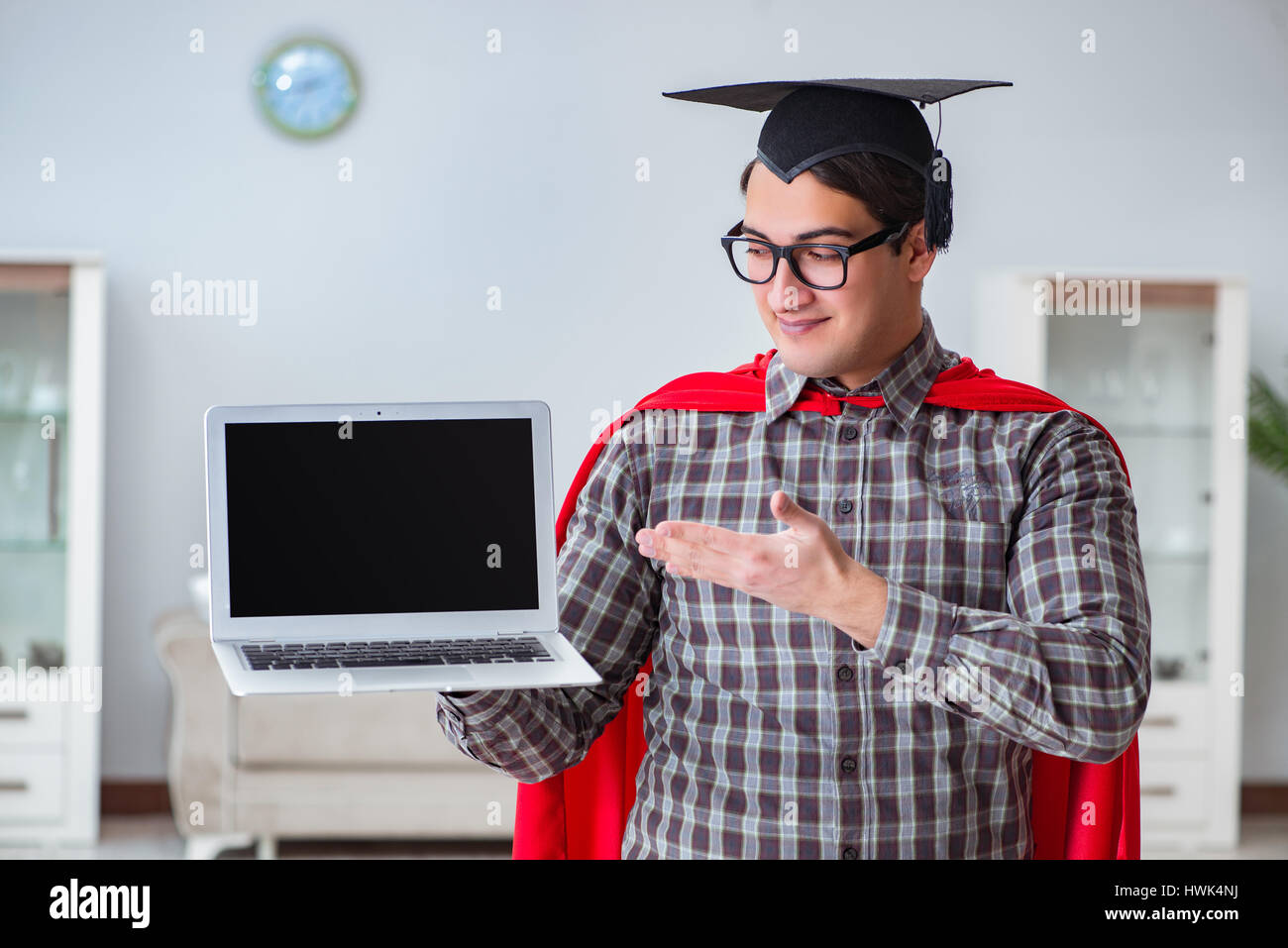 Super hero student with books studying for exams Stock Photo - Alamy