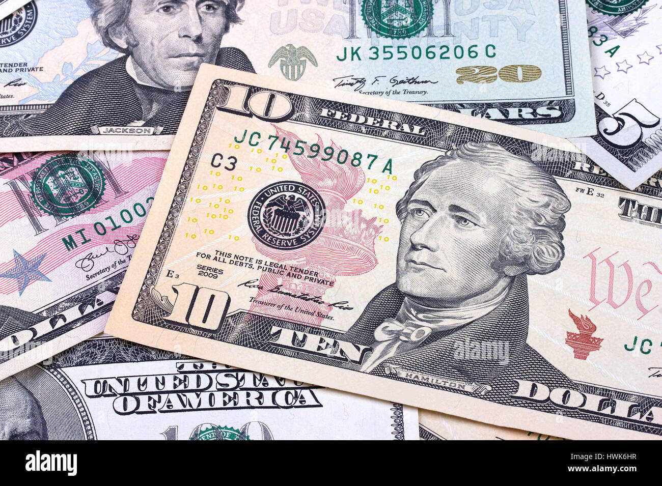 American dollar bills of different denominations abstract background ...