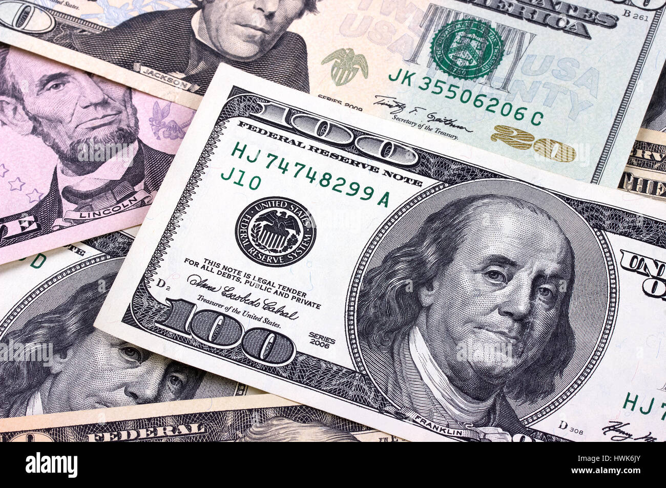 American dollar bills of different denominations abstract background ...