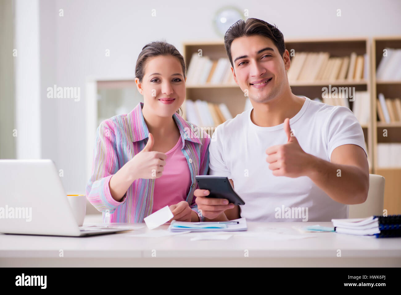 Young family discussing family finances Stock Photo - Alamy