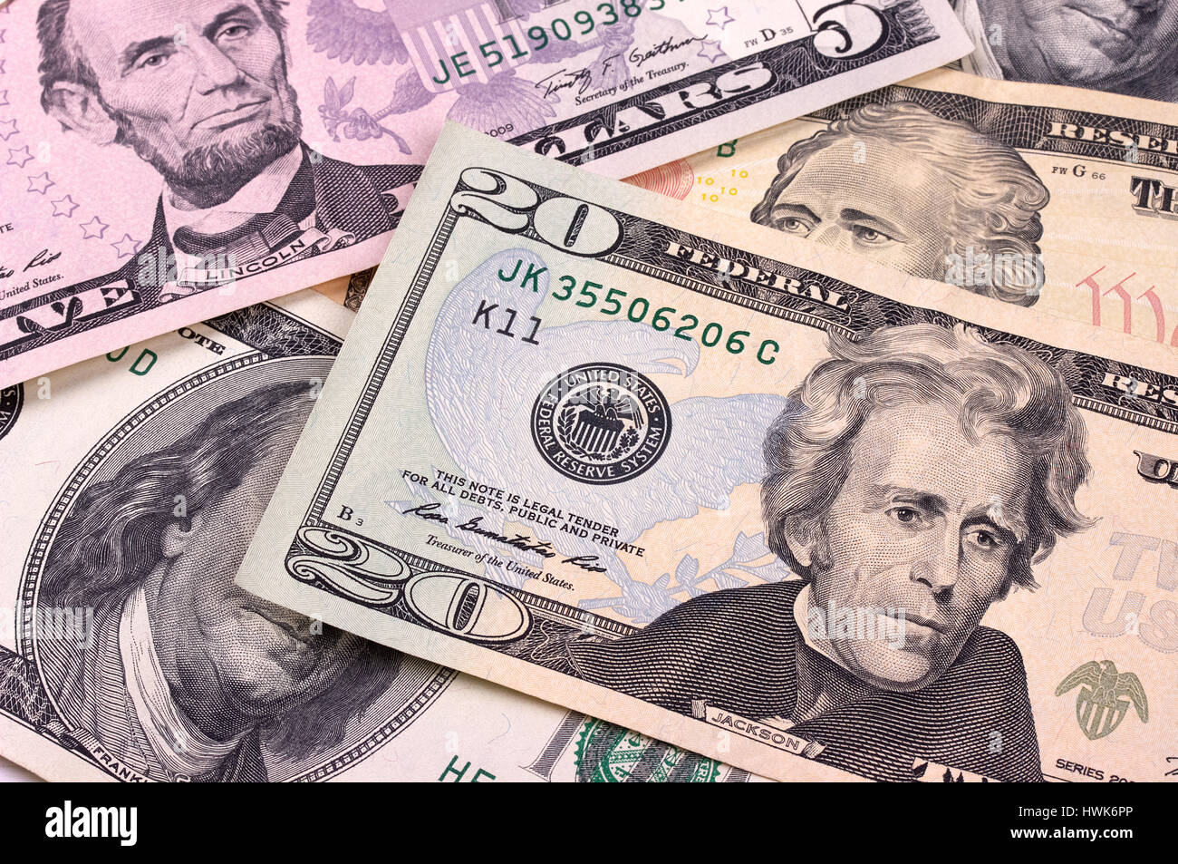 American dollar bills of different denominations abstract background ...