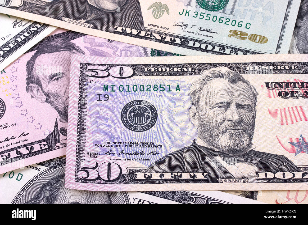 American dollar bills of different denominations abstract background ...