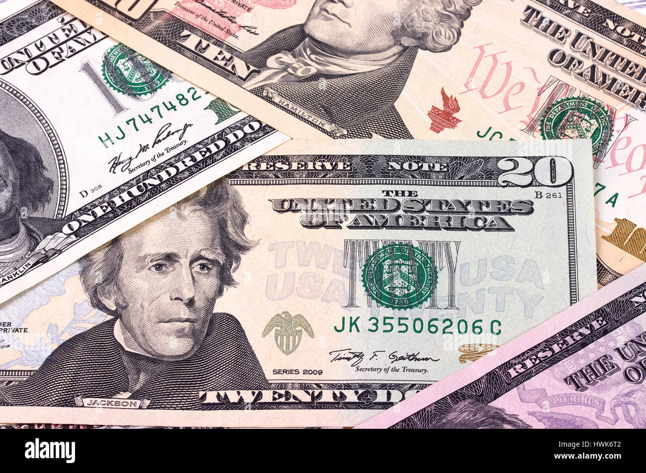 American dollar bills of different denominations abstract background ...