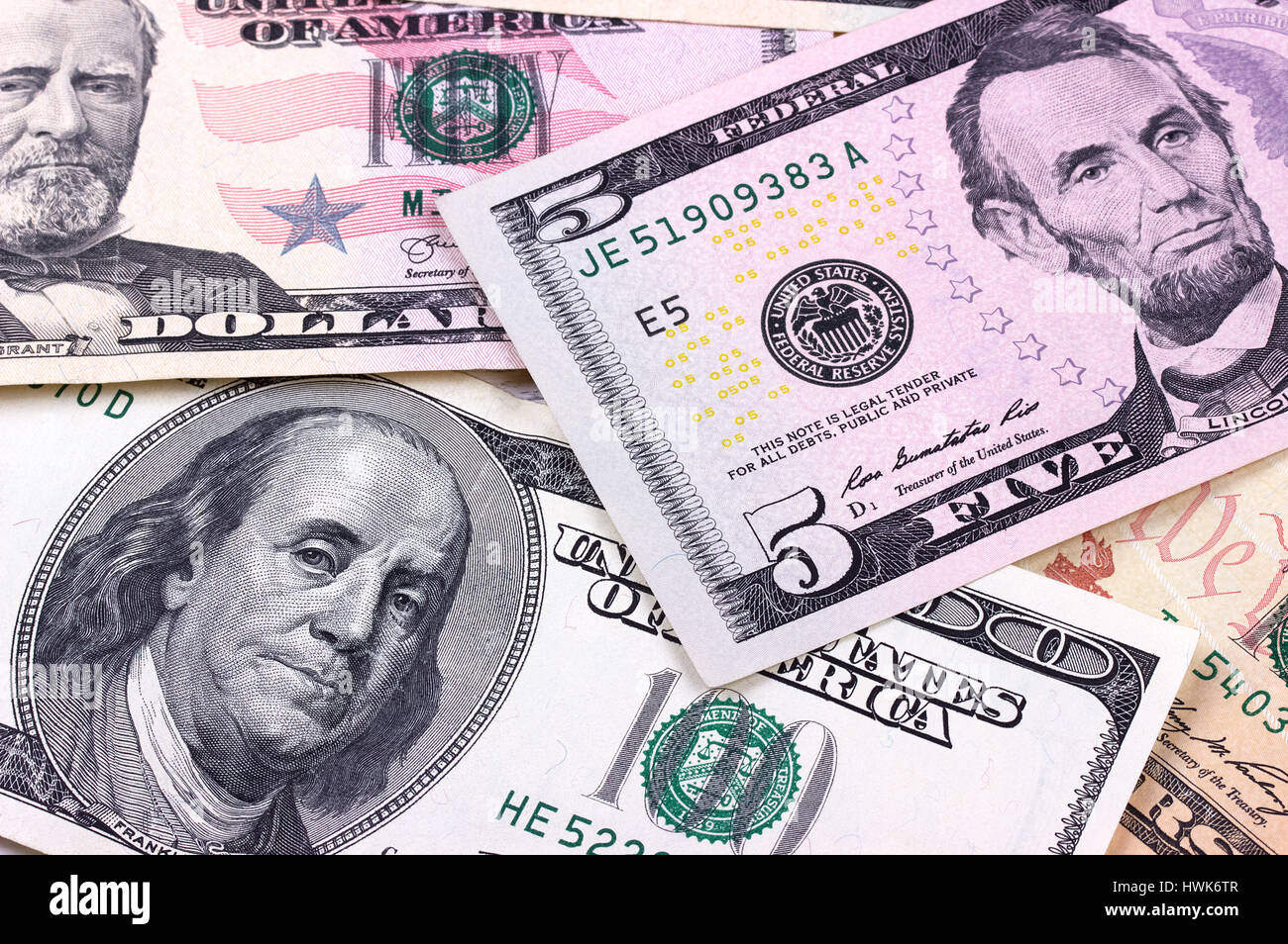 American dollar bills of different denominations abstract background ...