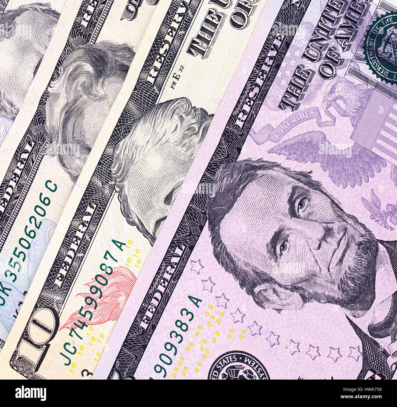 American dollar bills of different denominations abstract background ...