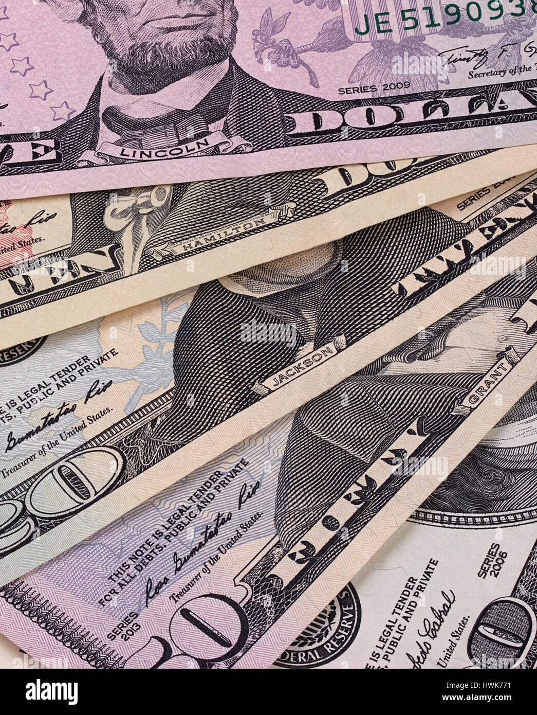 American dollar bills of different denominations abstract background ...