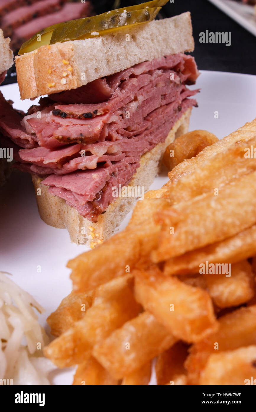 smoked meat sandwich with fries Stock Photo - Alamy
