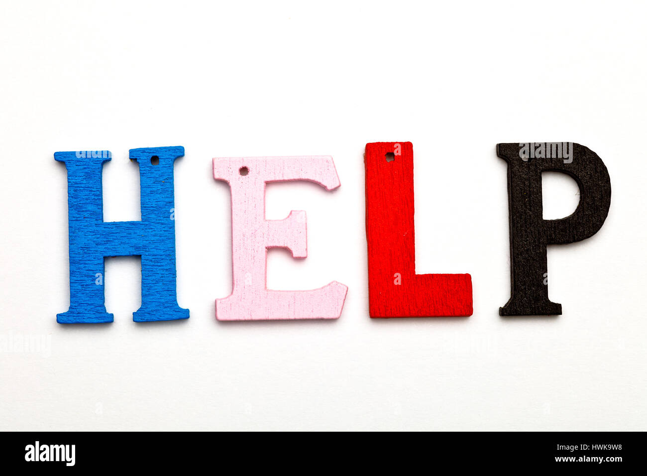 Composition of letters forming the word HELP Stock Photo - Alamy