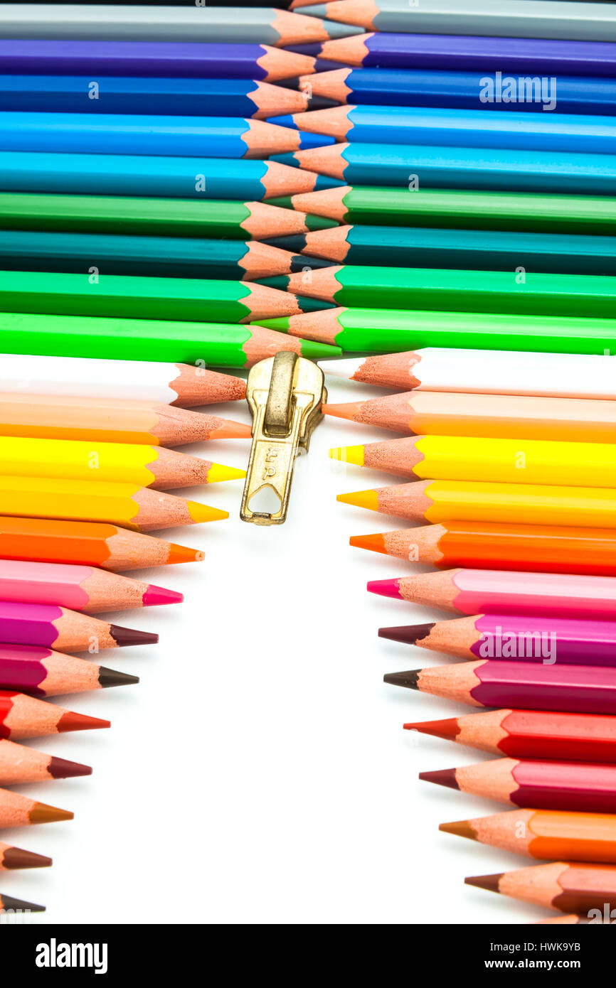 Composition of color pencil forming a zipper Stock Photo - Alamy