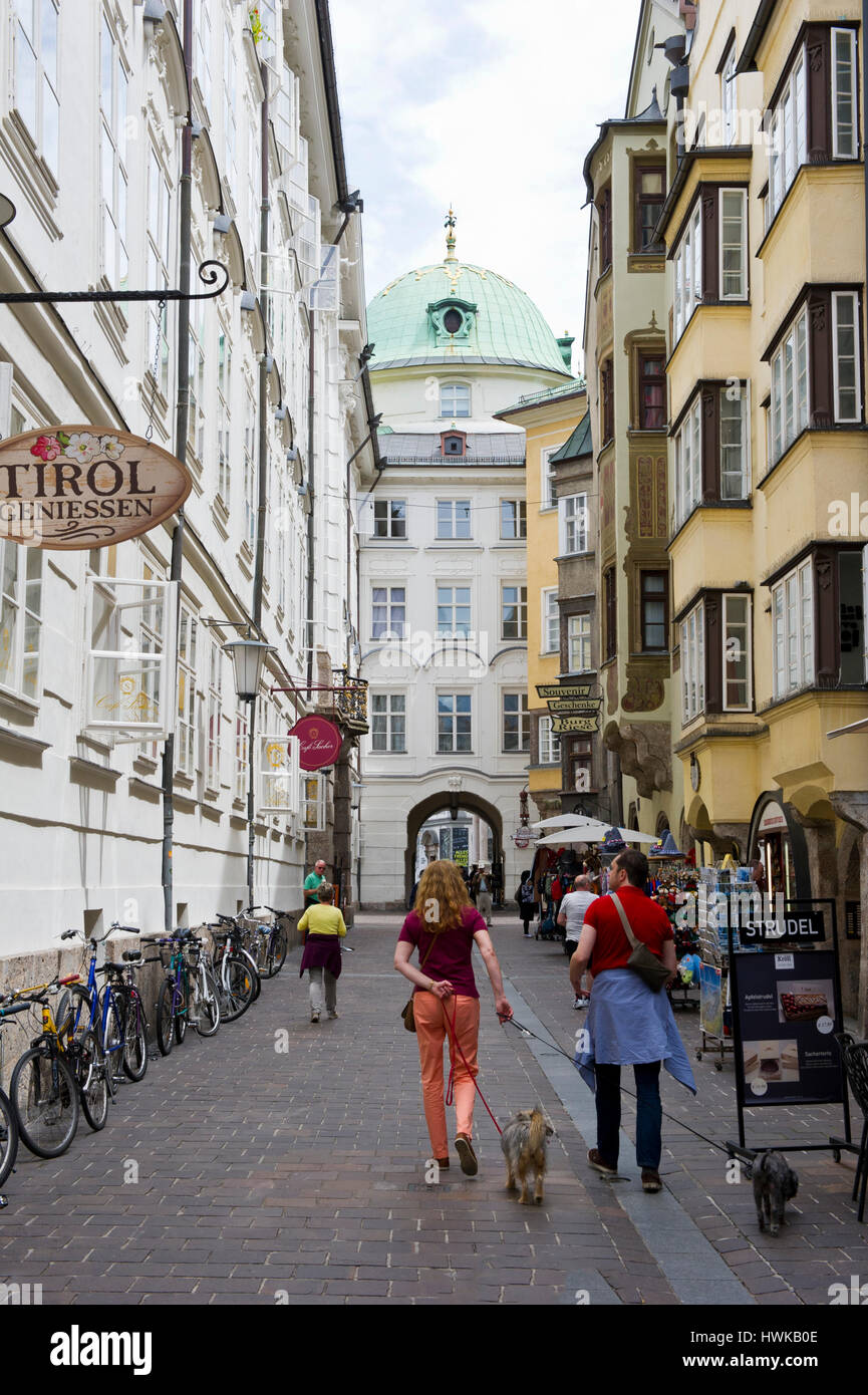 A typical narrow street with rows of shops in the Old Town, Innsbruck ...